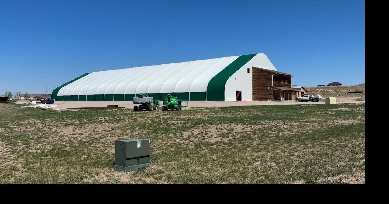 Riata Ranch Event Center's wind damaged indoor arena roof sees repair ...