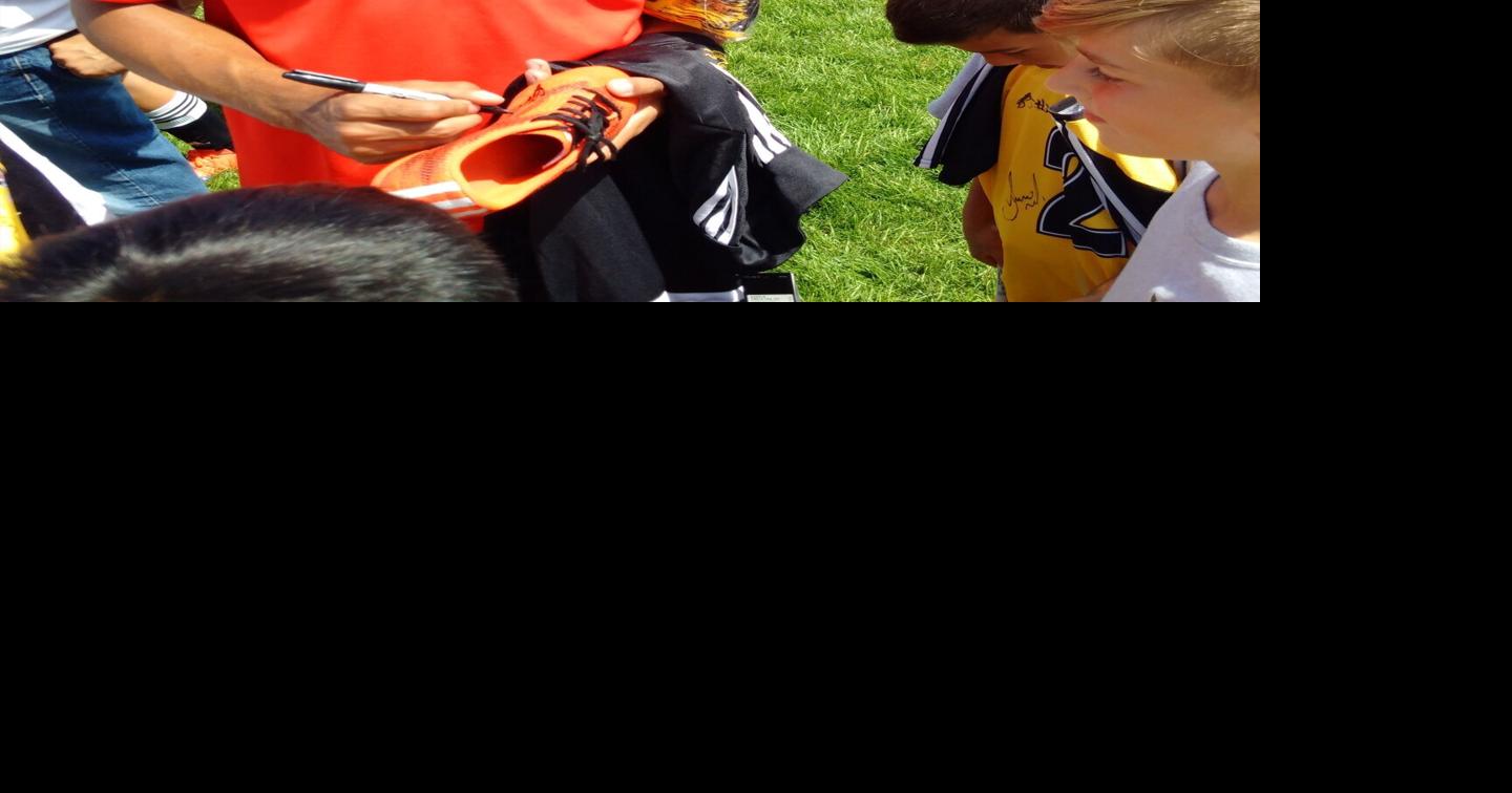 Markham soccer grads give back