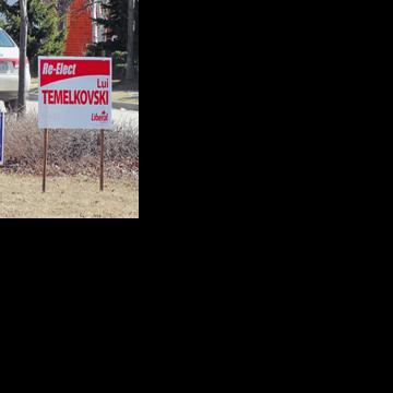 ‘Re-elect’ signs irk MP, voters