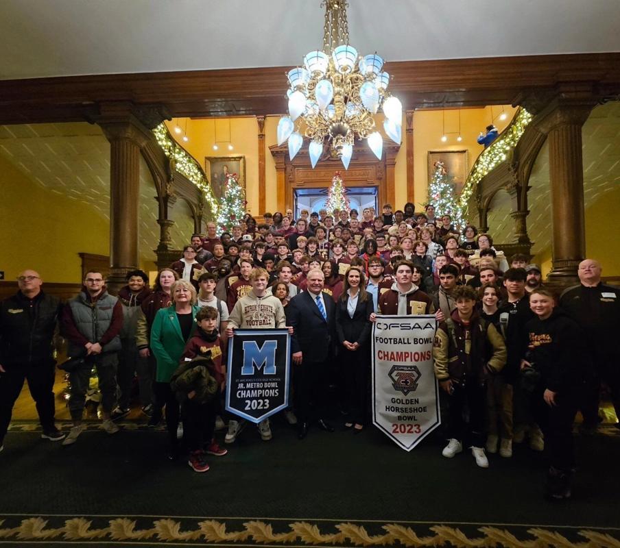 Newmarket high school’s football teams make history