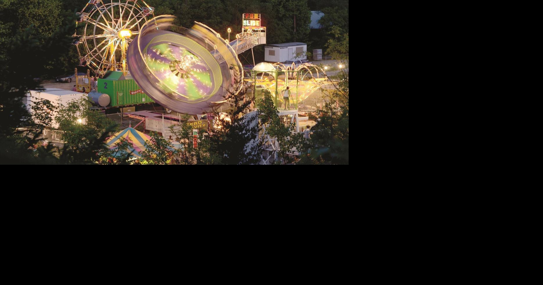 Midway, horses, demolition derby; Schomberg Fair has it all