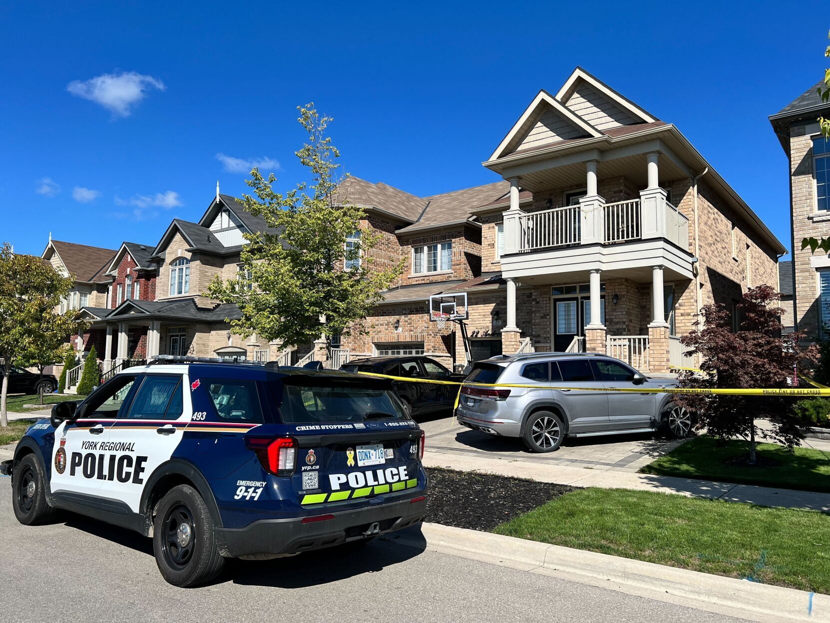 Charges laid in fatal Vaughan home invasion, suspect sought