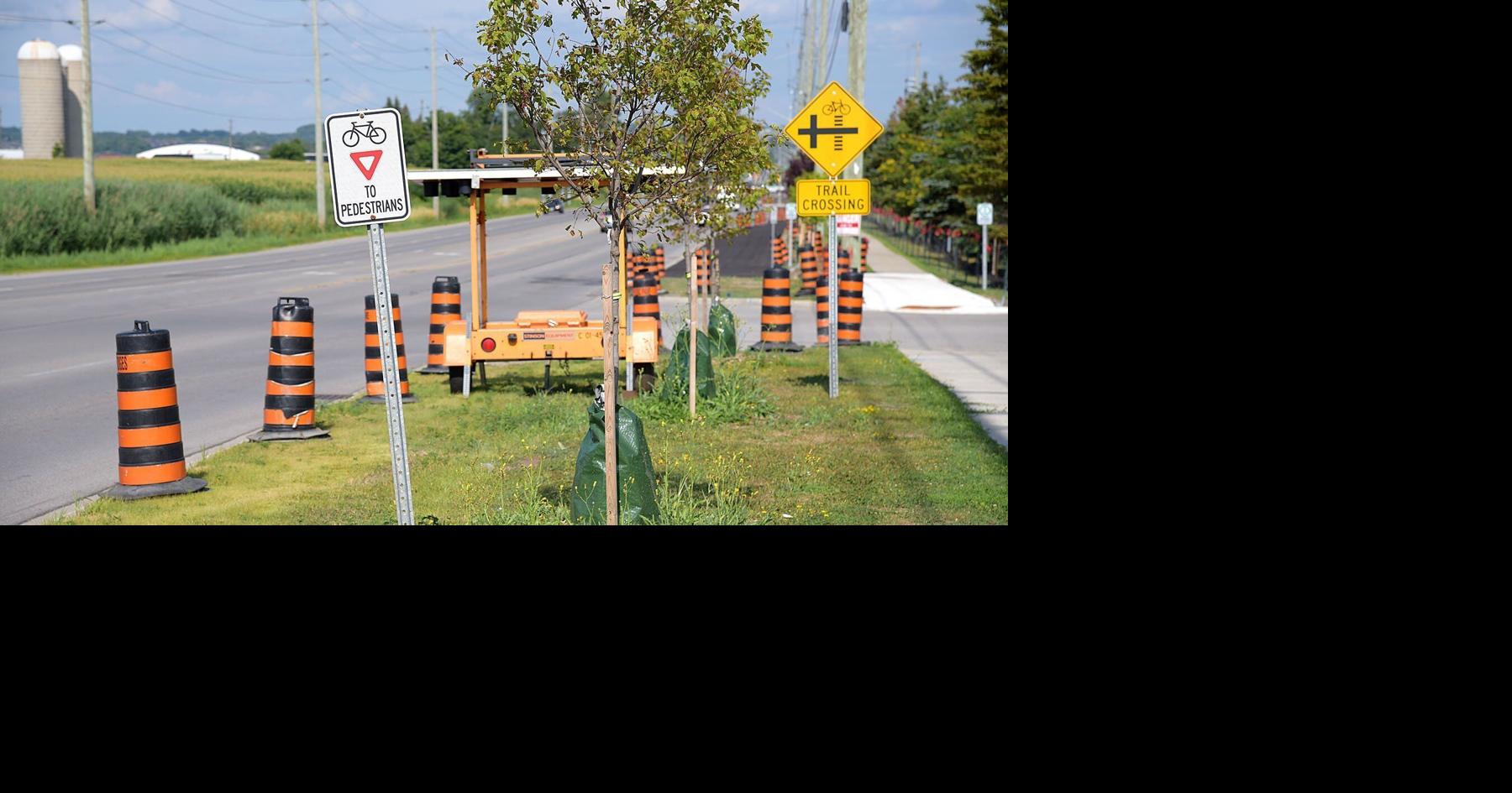 WHAT'S GOING ON HERE?: Paved bike lane along Green Lane in East Gwillimbury