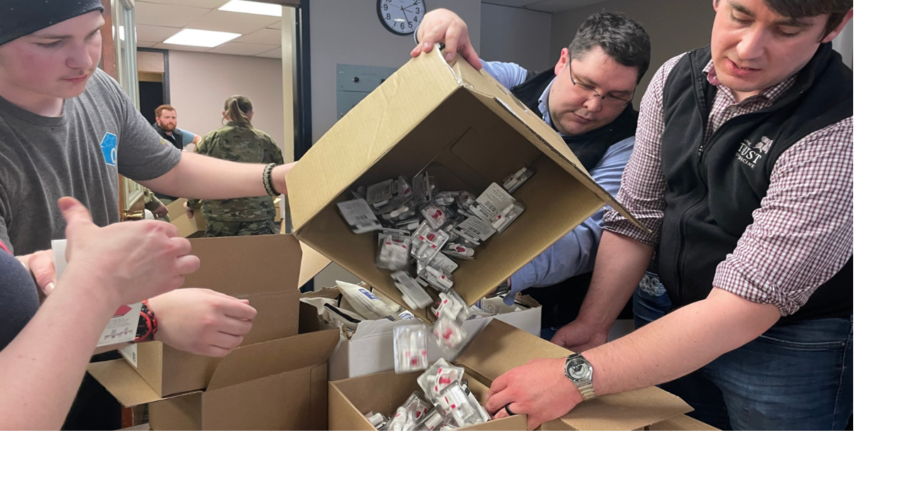 Anchorage volunteers assemble Narcan kits, aiming to combat overdose ...