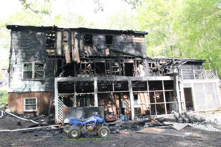 Family of seven escapes burning South Boston house; cause still under ...