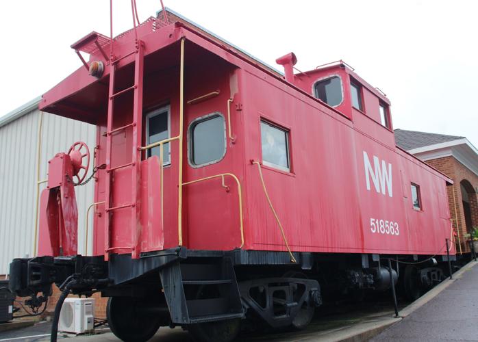 BACK ON TRACK: Museum cuts ribbon at caboose grand reopening, welcoming guests inside | Local ...