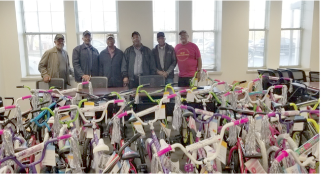 Deacons deliver bikes to social services | Religion | yourgv.com