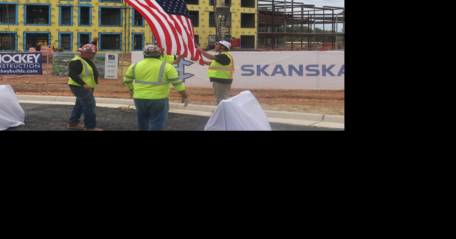 BEAMING IT UP: Topping-out ceremony celebrates progress on new Halifax ...