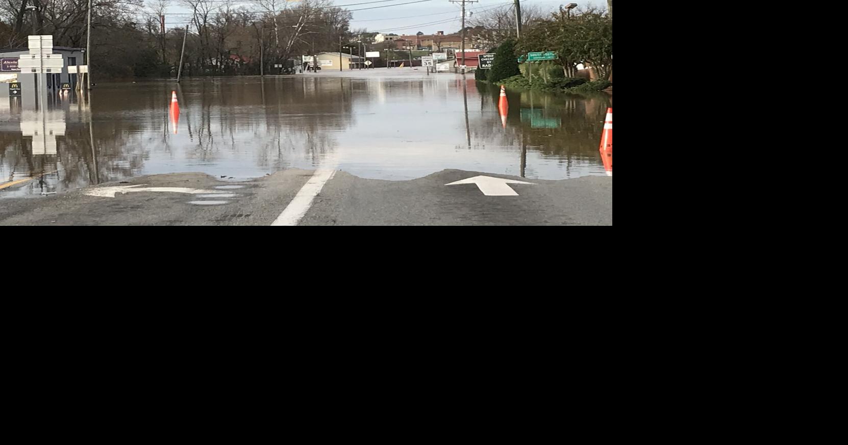 PHOTOS: Flooding closes intersection of U.S. 58, 501 in Riverdale ...