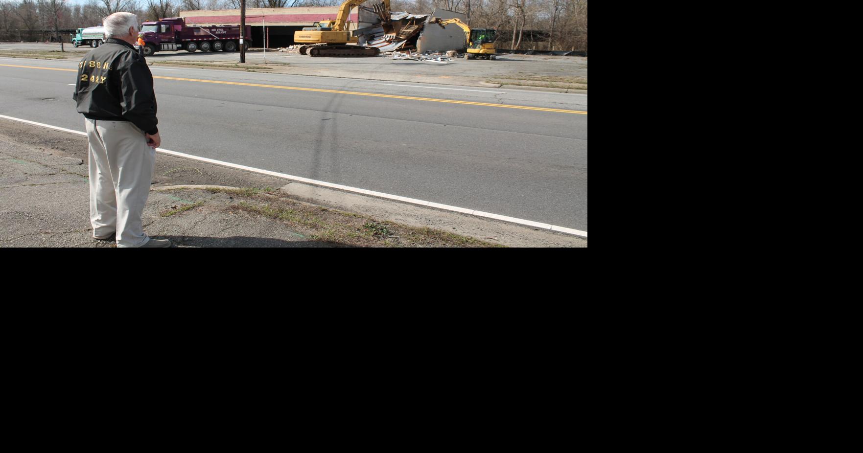 PHOTOS: Previous owner watches building tumble down | Local News ...