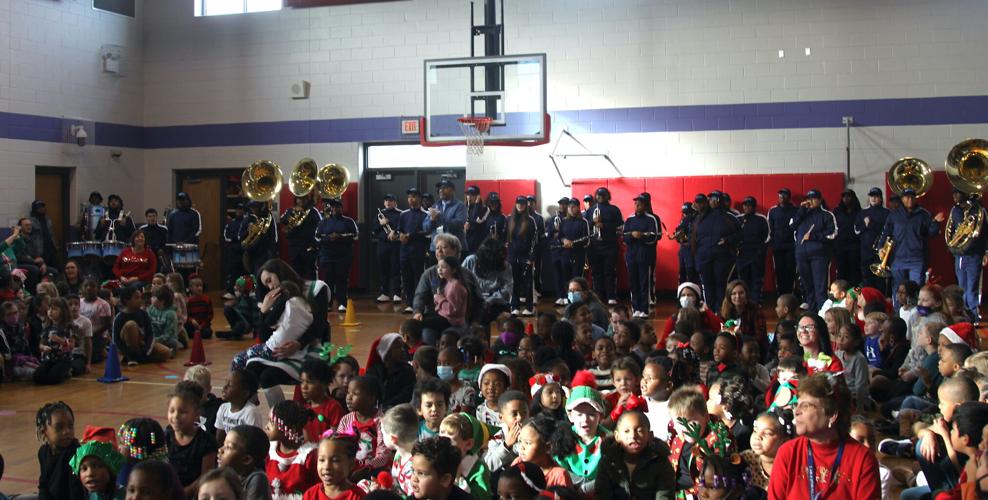 In a surprise to students, Santa delivers book vending machine to South ...