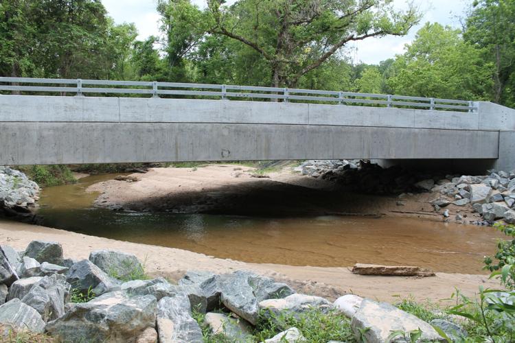 Bridge on Oak Level Road dedicated in memory of Herman O. Lewis Sr ...