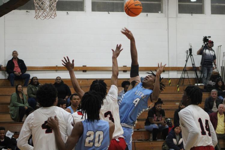 Halifax County boys hoops holds off Martinsville in Piedmont overtime ...