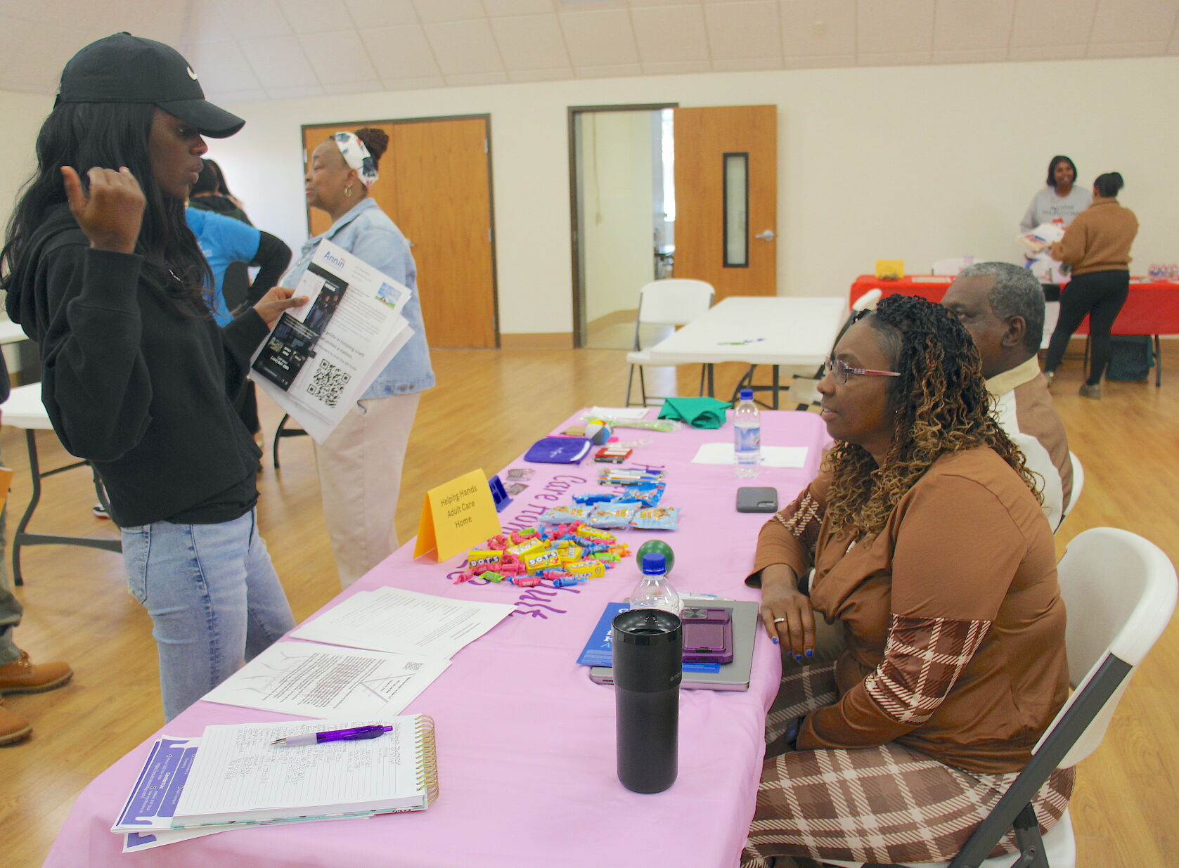 Steady flow of residents looking for work attend community job fair in ...